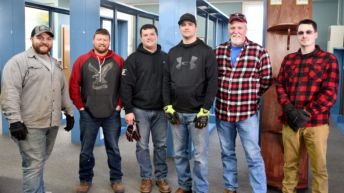 Dominion employees help prepare Renovo library for new flooring | News ...